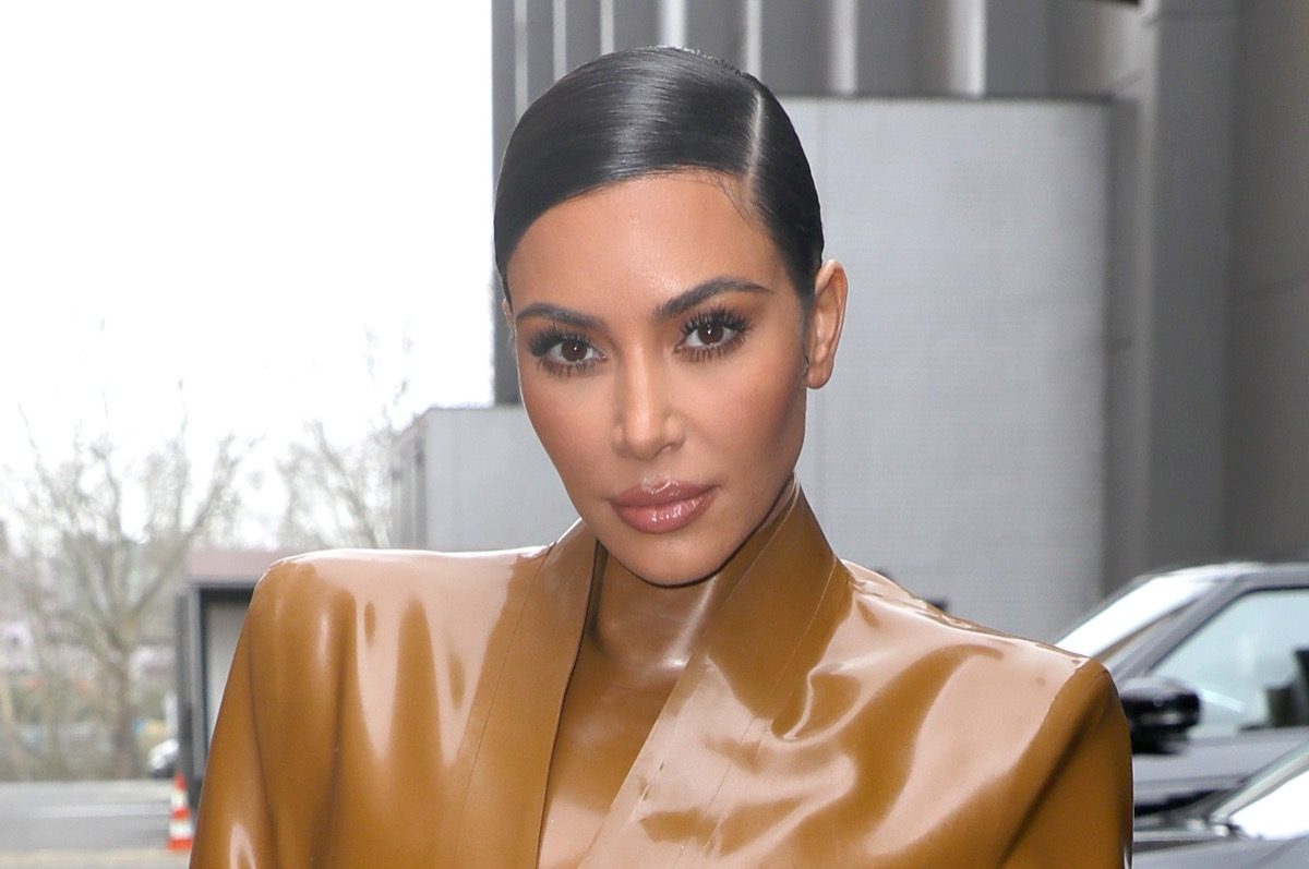 Kim Kardashian in Bathing Suit Poses Poolside — Celebwell