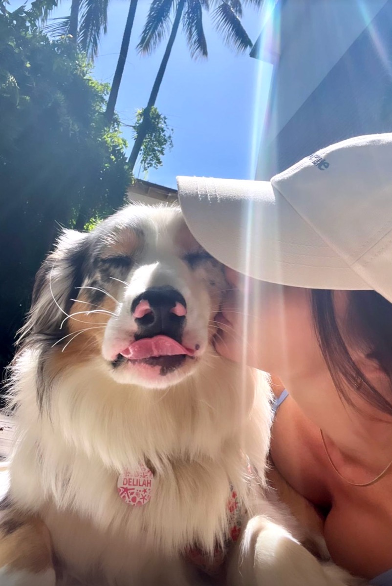 Brittany Hockley in Bathing Suit Smooches Her Dog Deliah — Celebwell