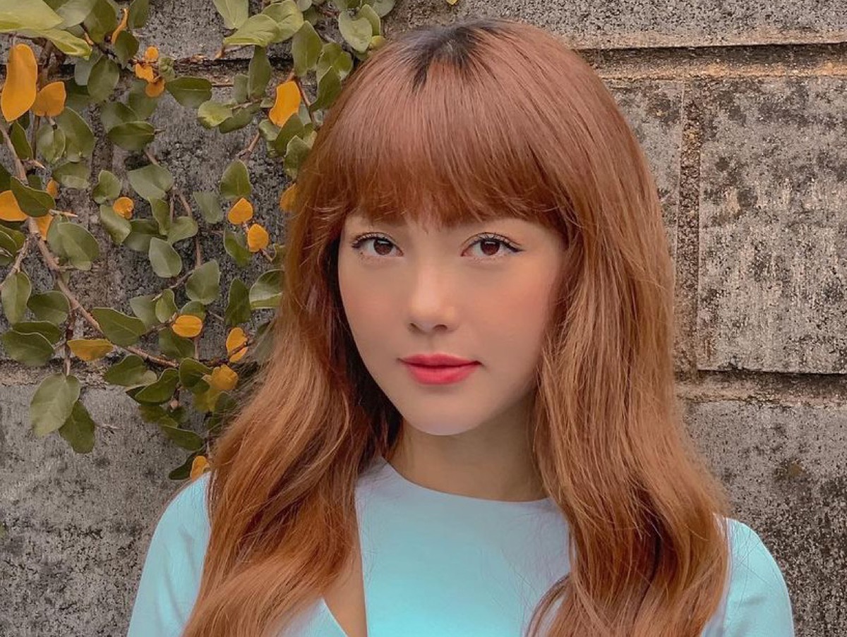 Minh Hằng in Bathing Suit Says "Enjoy Life" — Celebwell