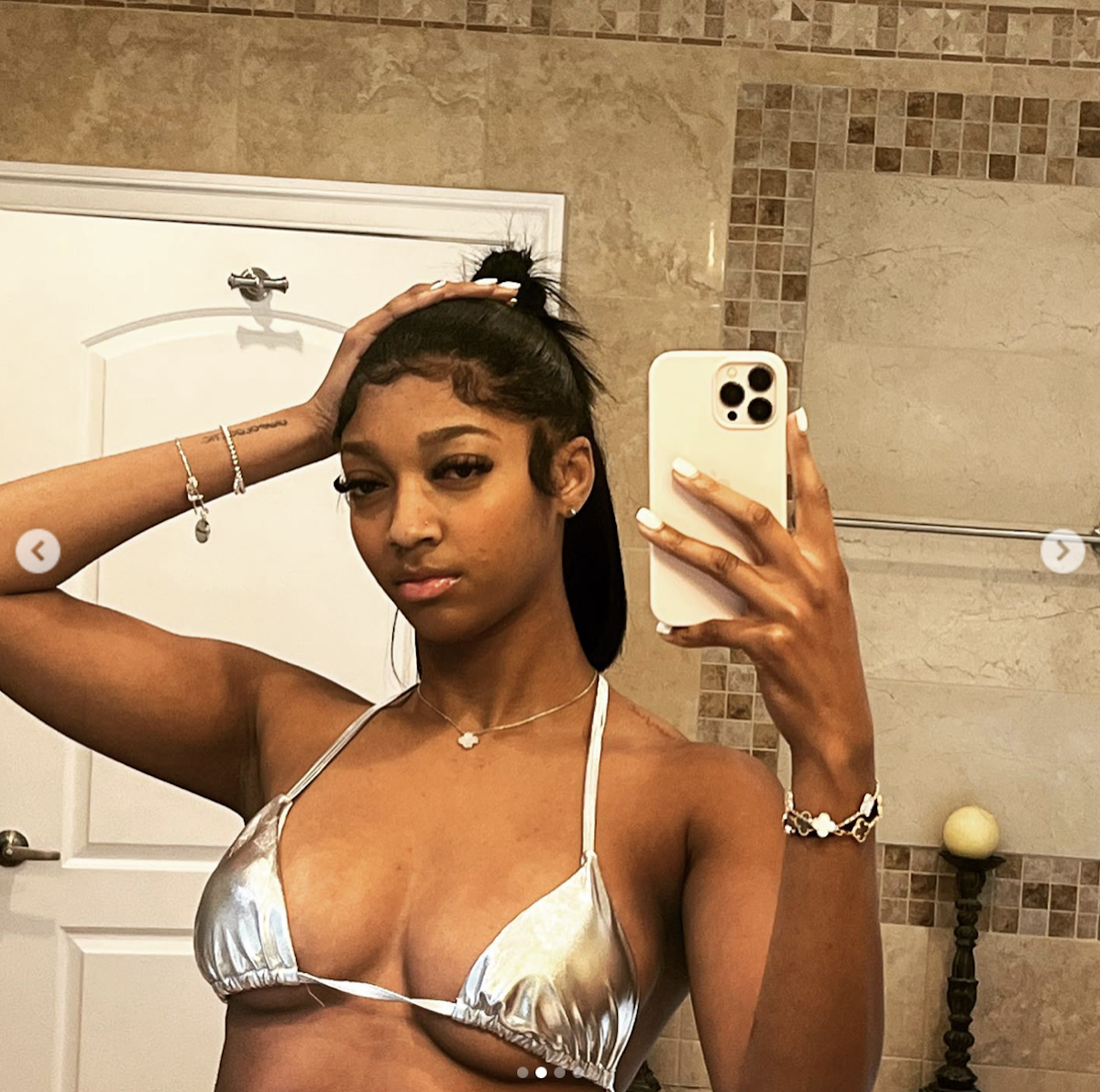 Angel Reese Shares Swimsuit Photo Saying "I'm the Catch" — Celebwell