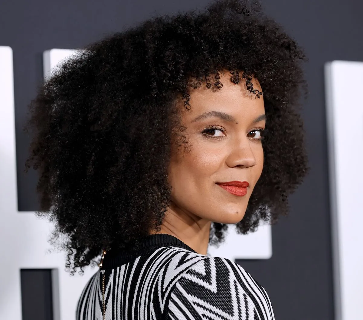 Reacher Star Maria Sten in Bathing Suit Says “It’s 92 In the Shade”