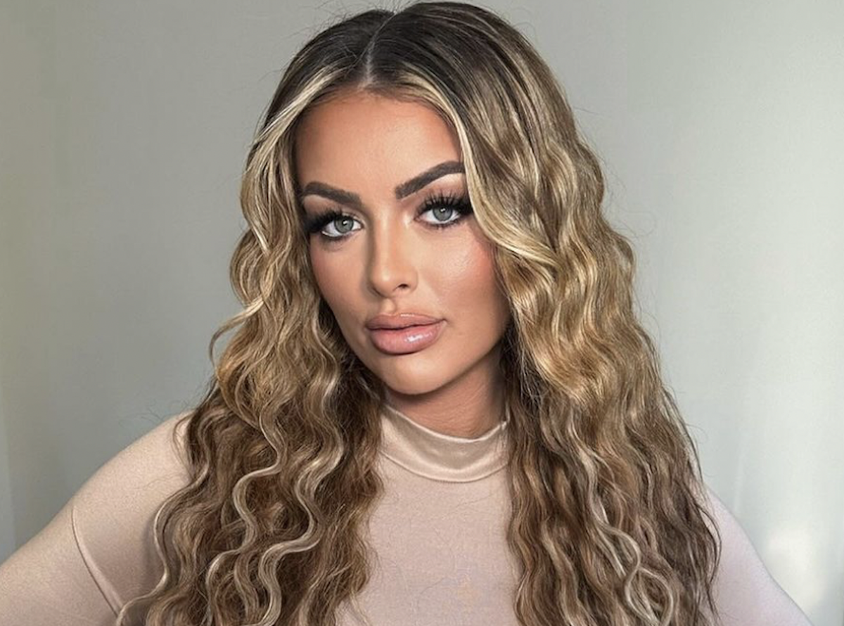 Wrestler Mandy Rose In One-Piece Bodysuit Shares “Perfect” Glute Workout