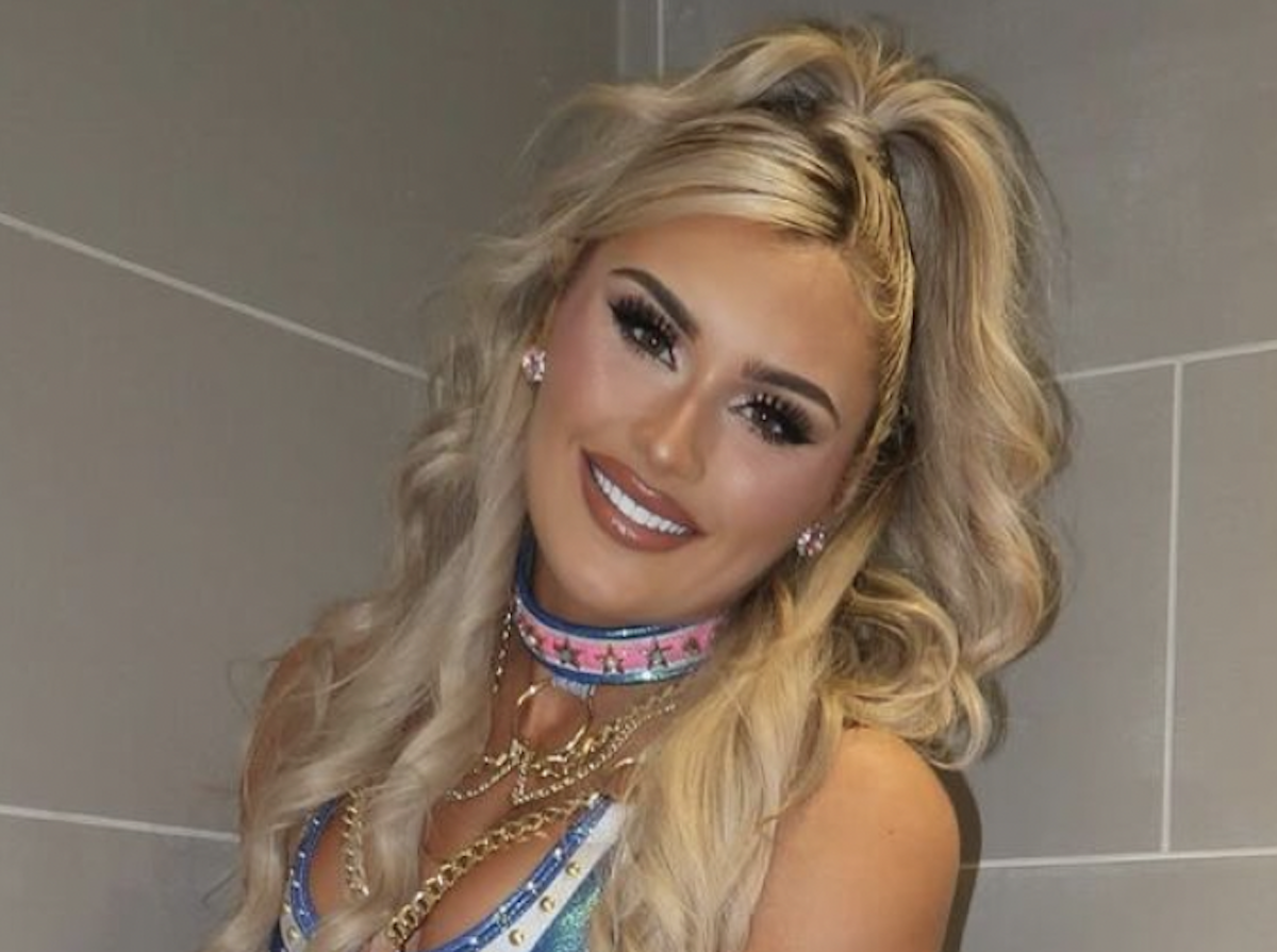 Tiffany Stratton in Pink Workout Gear Says "Buff Barbie Reporting For ...