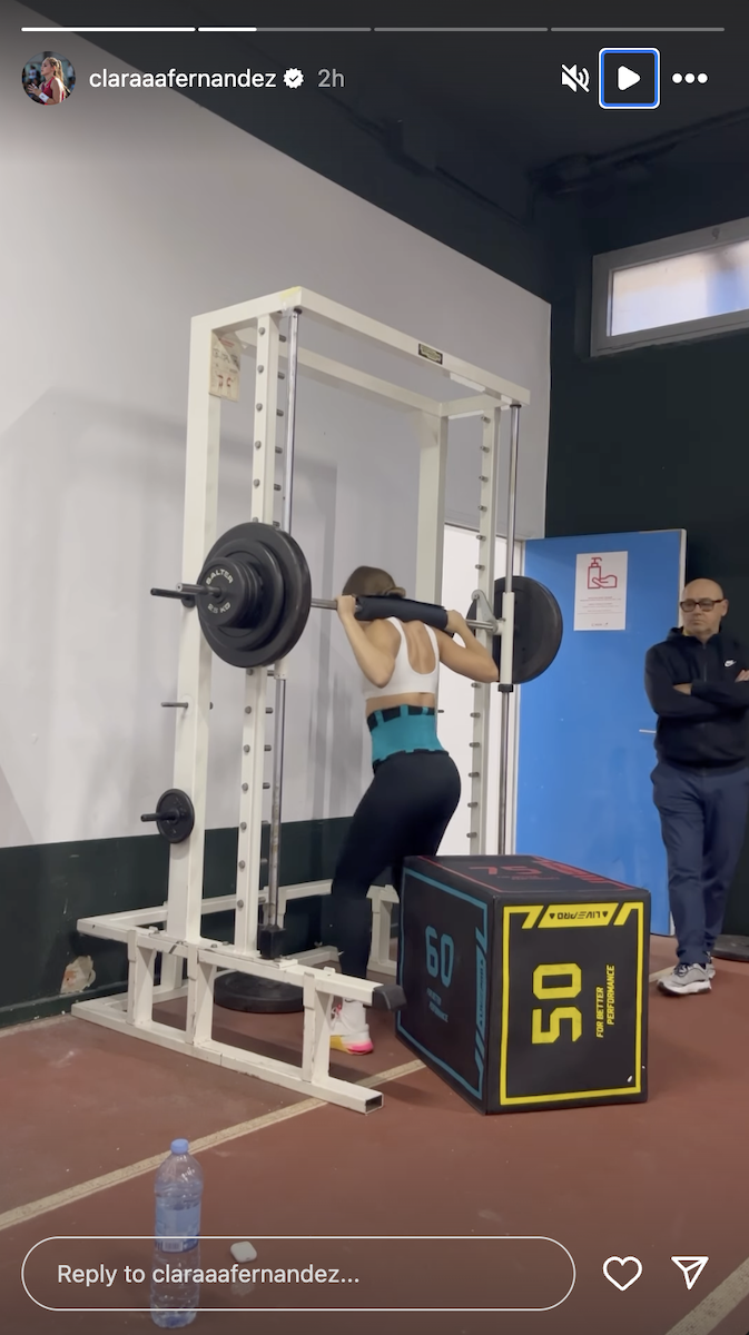 Clara Fernández in Two-Piece Workout Gear Does Squats With Heavy Weights