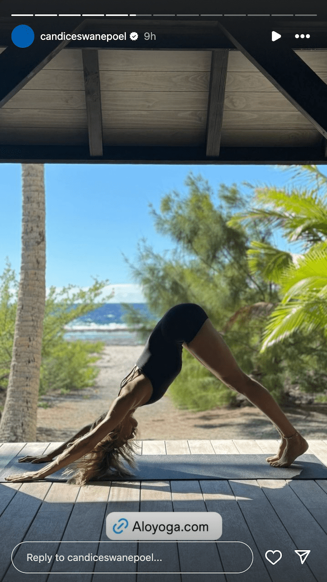 Candice Swanepoel in Workout Gear Does Downward Dog