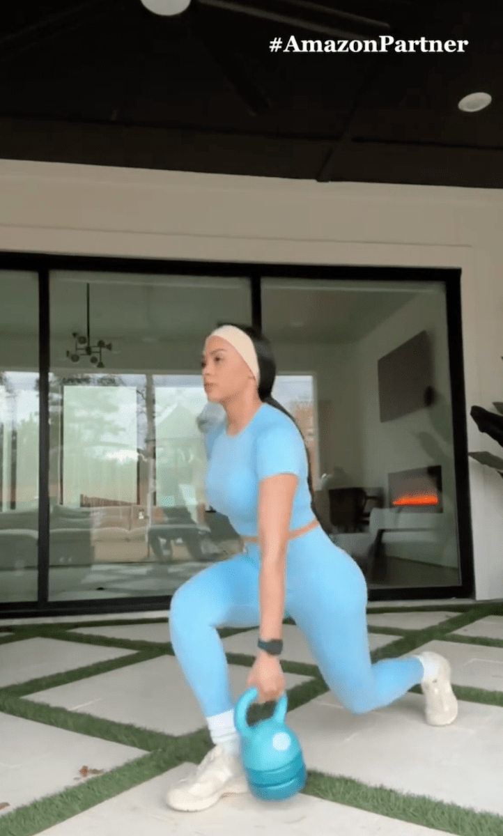 Kristy Sarah in Two-Piece Workout Gear Shares "Day One of Moving In"