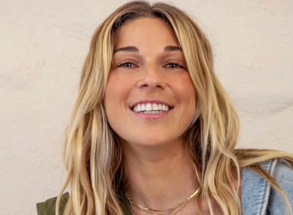 Surfer Coco Ho in Two-Piece Workout Gear Says "J’adore Hossegor"