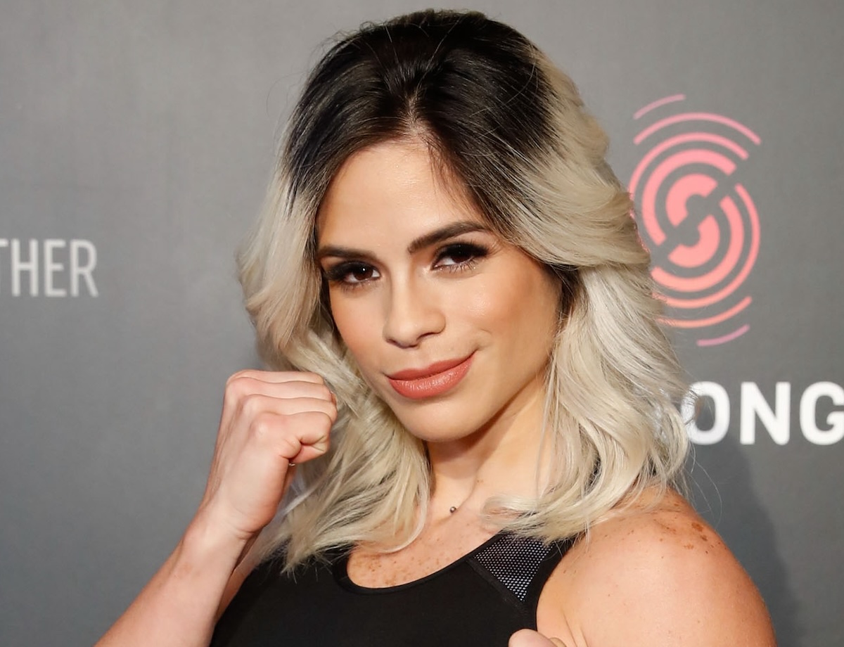 Michelle Lewin in Two-Piece Workout Gear Strikes a Pose in Striking New ...